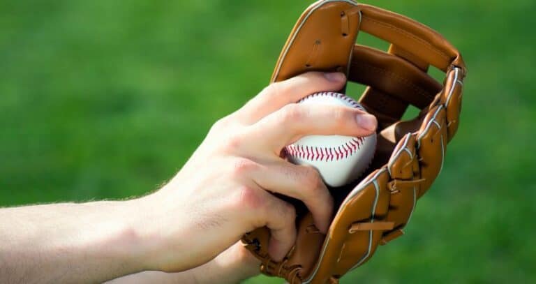 Why Do Baseball Players Have One Finger Out Of The Glove?